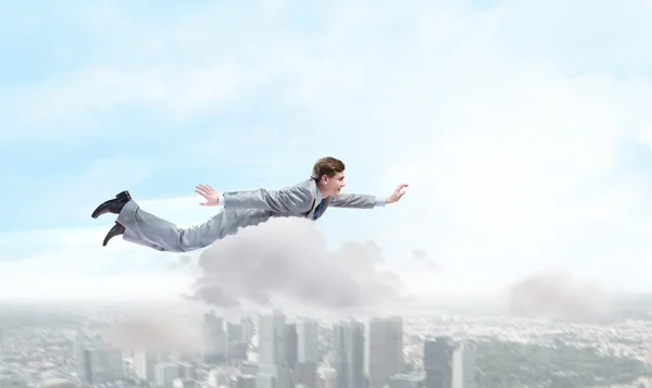 Homme volant ciel Stock Photos, Royalty Free Homme volant ciel Images ...