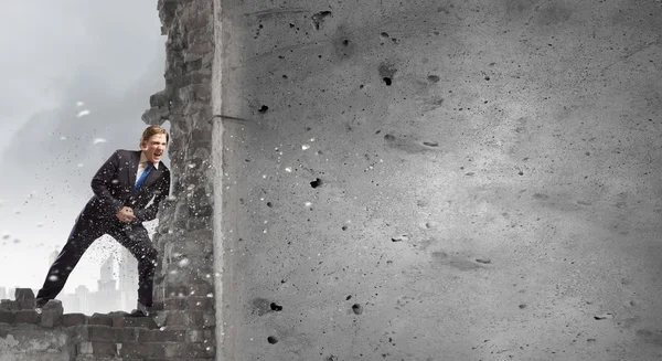 Hands Pushing A Wall