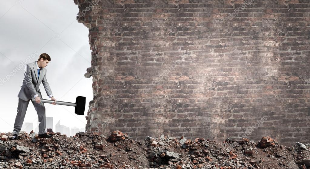Empresario rompiendo muro: fotografía de stock © SergeyNivens #52674437 ...