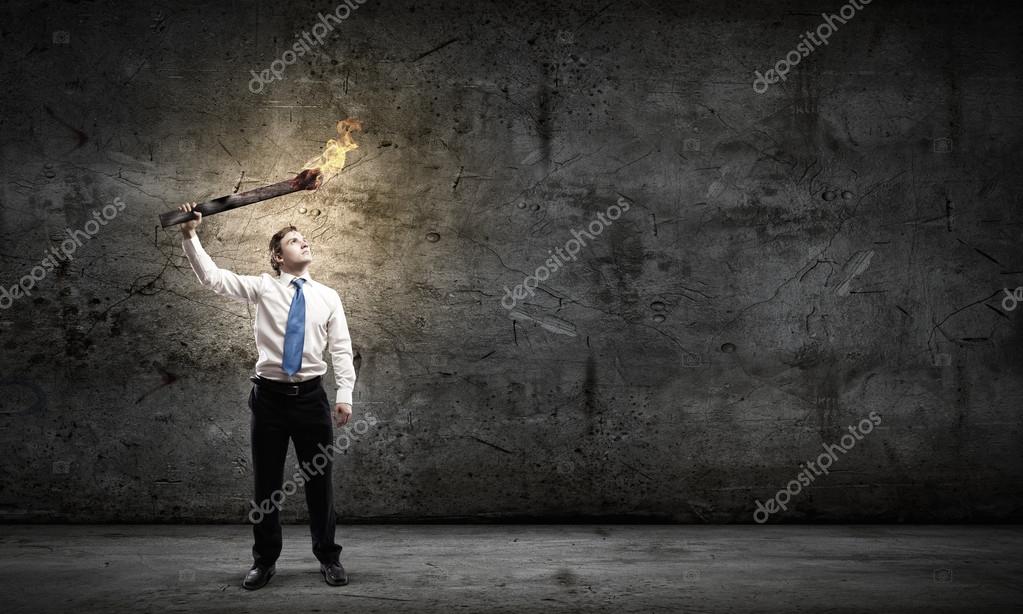Man with torch Stock Photo by ©SergeyNivens 54138367
