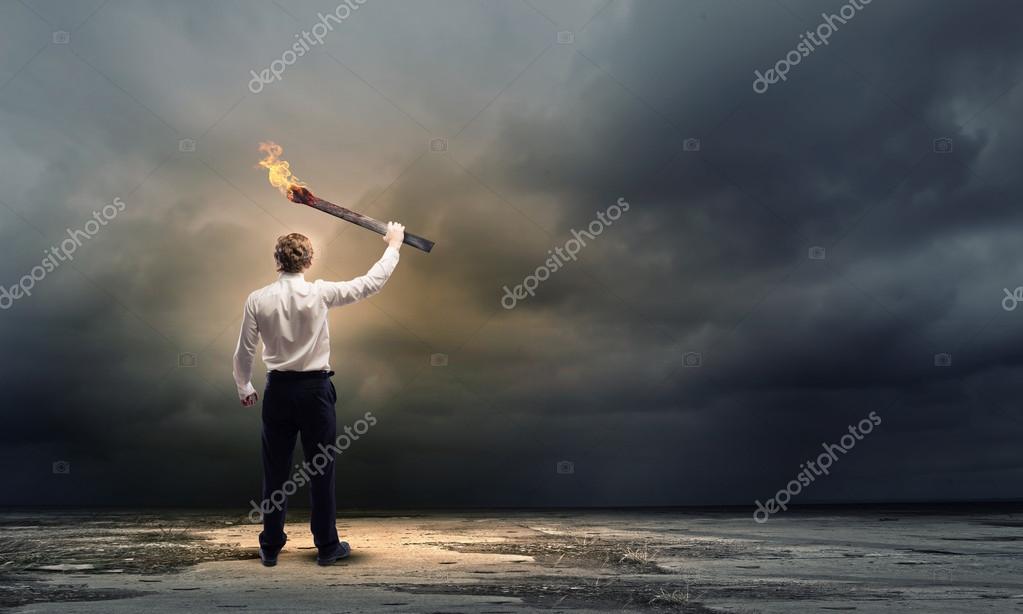 Man with torch — Stock Photo © SergeyNivens #54139679