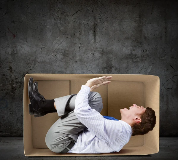 Man in box Stock Photo by ©SergeyNivens 55165583