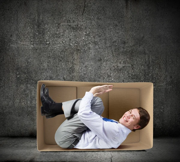 Man in box Stock Photo by ©SergeyNivens 55165583