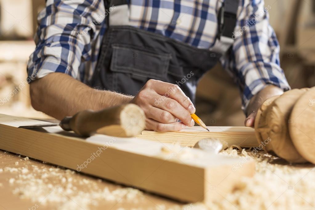 Carpenter at work — Stock Photo © SergeyNivens #73855097 Carpenter at work — Stock Photo © SergeyNivens #73855097