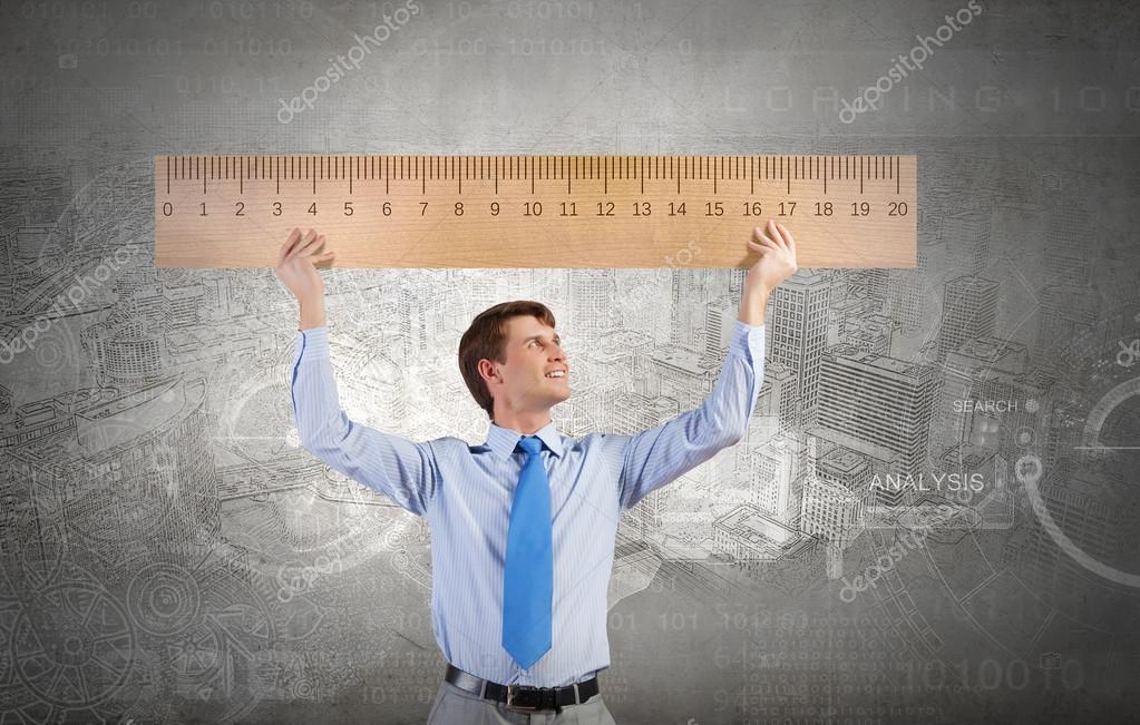 Man with scale Stock Photo by ©SergeyNivens 77687504