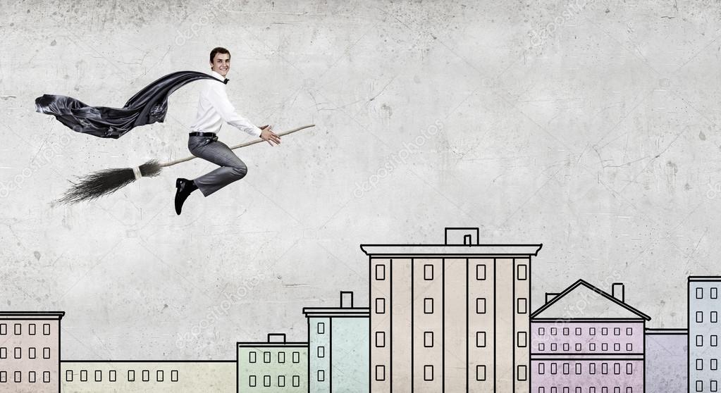 Man ride broom Stock Photo by ©SergeyNivens 79321258