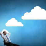 Businessman works over a cloud Stock Photo by ©alphaspirit 13898623