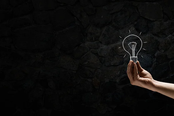 Great bright idea in darkness - Stock Image - Everypixel