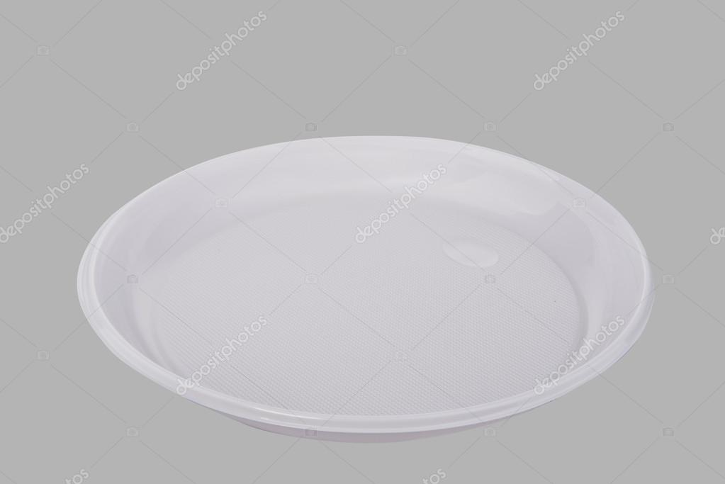 Disposable plastic plate Stock Photo by ©artfotoss 83596556