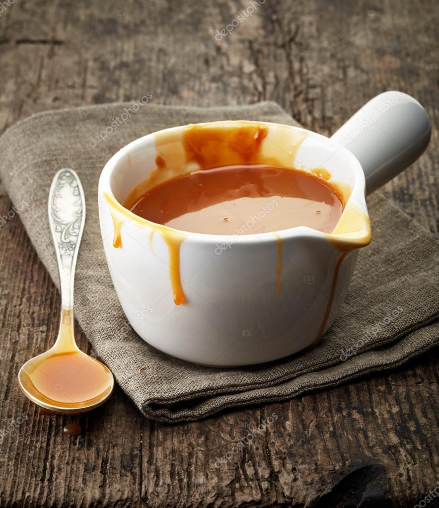 Melted caramel sauce — Stock Photo © magone #60387959