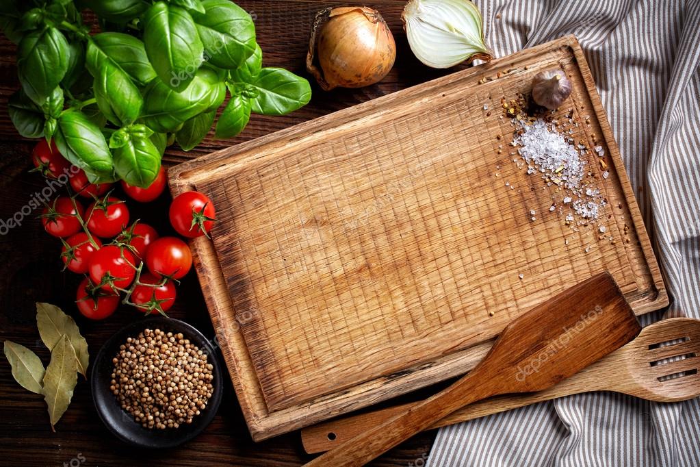 Cooking background with old cutting board — Stock Photo © magone #99051778