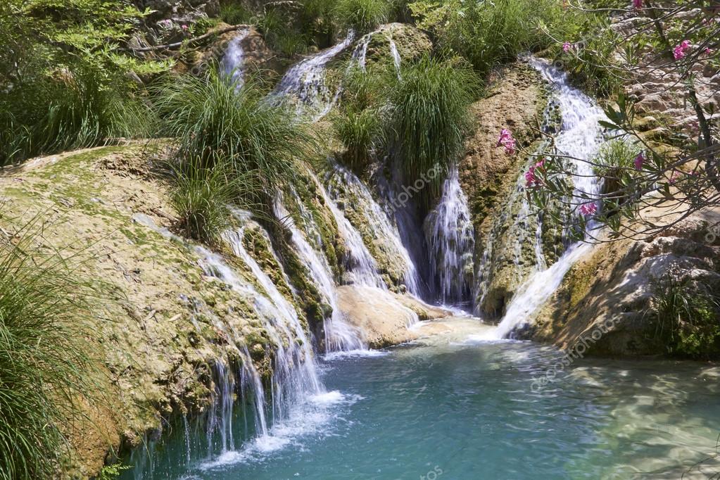 Natural waterfall and lake in Polilimnio area. Greece — Stock Photo ...