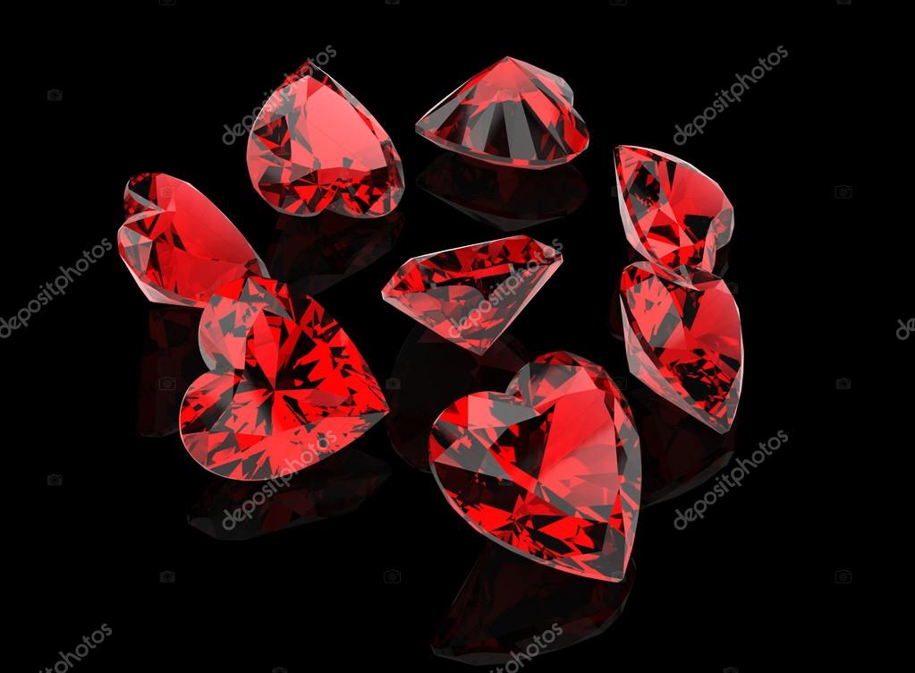 Heart shape red gemstones Stock Photo by ©Rozaliya 65787937