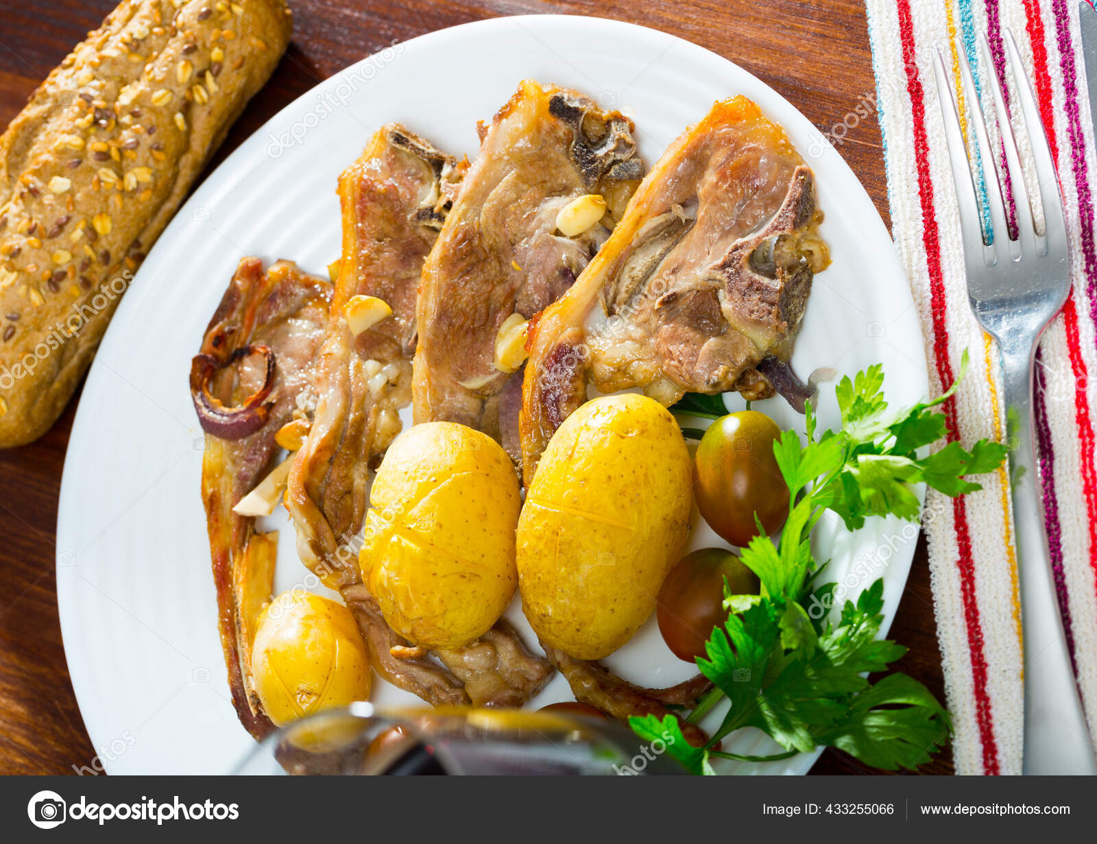 Roasted lamb ribs with potato Stock Photo by ©Jim_Filim 433255066
