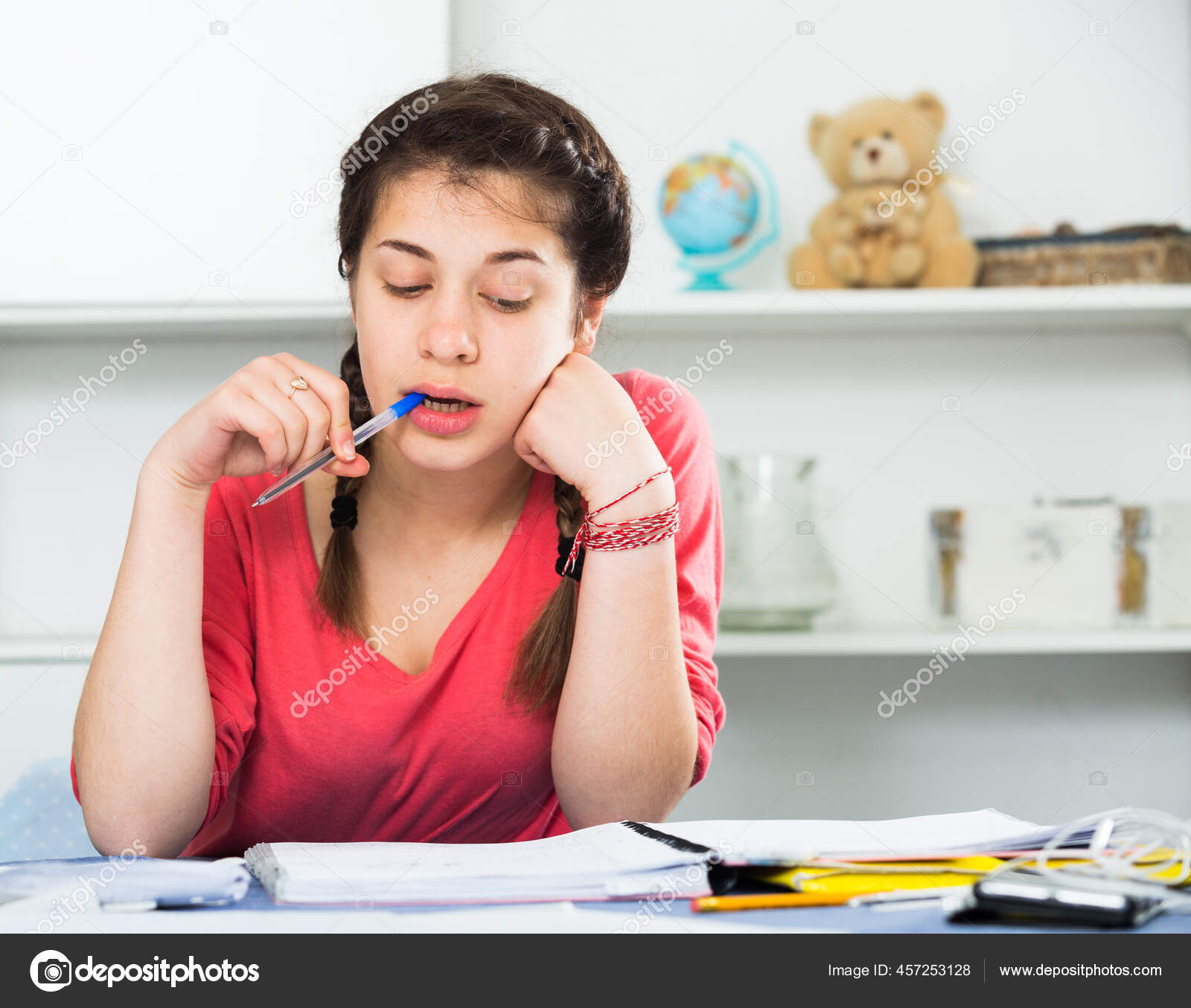Girl doing homework — Stock Photo © Jim_Filim #457253128