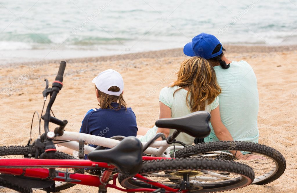 Family with bicycles on beach ⬇ Stock Photo, Image by © Jim_Filim #60313523