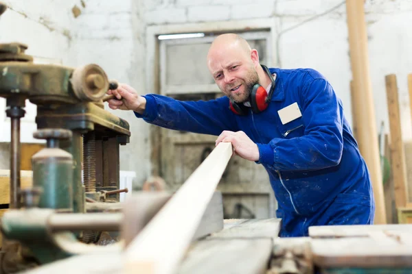 Employee works on the machine - Stock Image - Everypixel