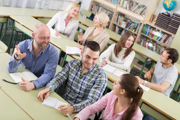 Professionals taking notes at training session - Stock Image - Everypixel
