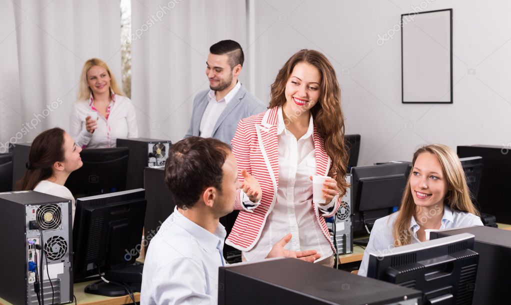 Happy employees and manager celebrating — Stock Photo © Jim_Filim #77488772