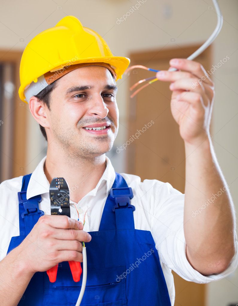 Professional electrician working — Stock Photo © Jim_Filim #93242194