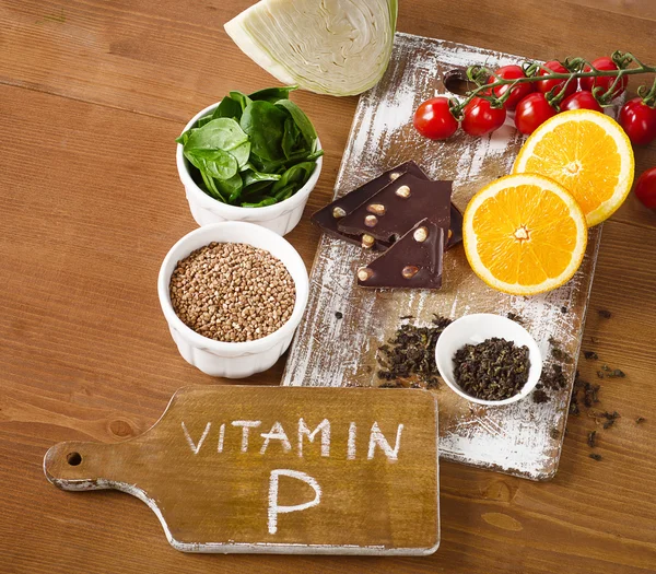 Foods high in vitamin P on table Stock Photo by ©bit245 107831122