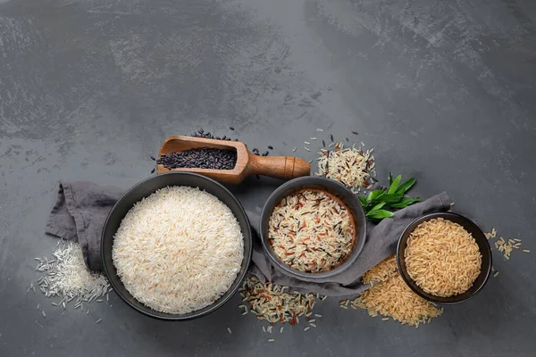 Set Different Types Rice Grey Background Stock Photo by ©bit245 436992376