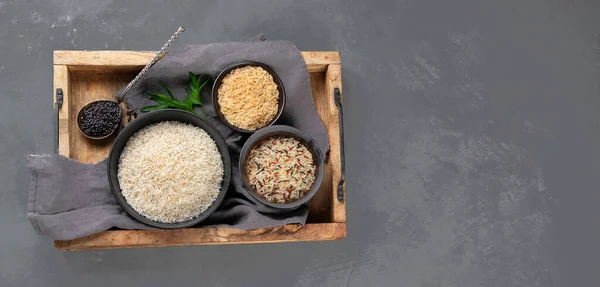 Set Different Types Rice Grey Background Stock Photo by ©bit245 436992376