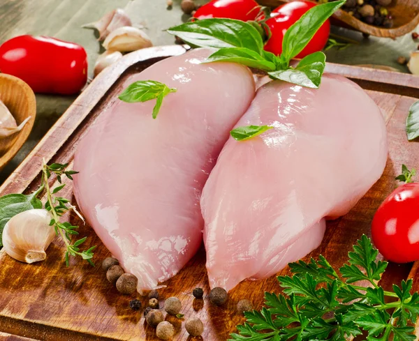 Raw chicken fillets — Stock Photo © bit245 #60803781