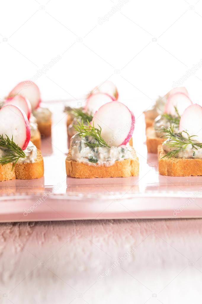 Canapes with radish Stock Photo by ©oksixx 74429011