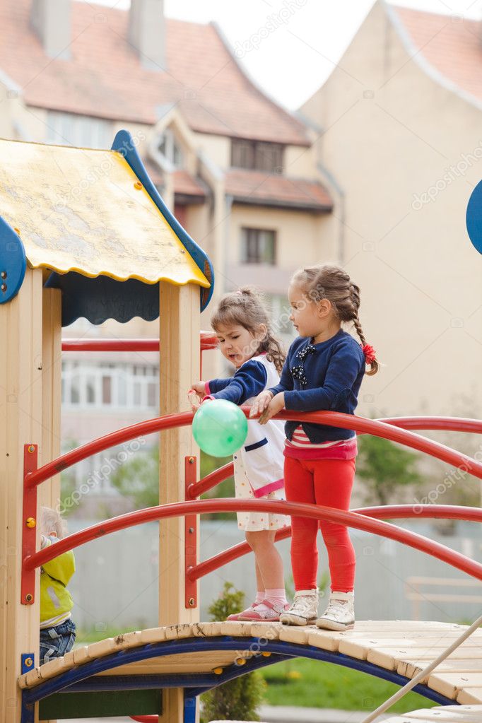 Children at the playground Stock Photo by ©oksixx 78025064