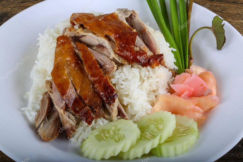 Roasted duck with rice — Stock Photo © AndreySt #100852316