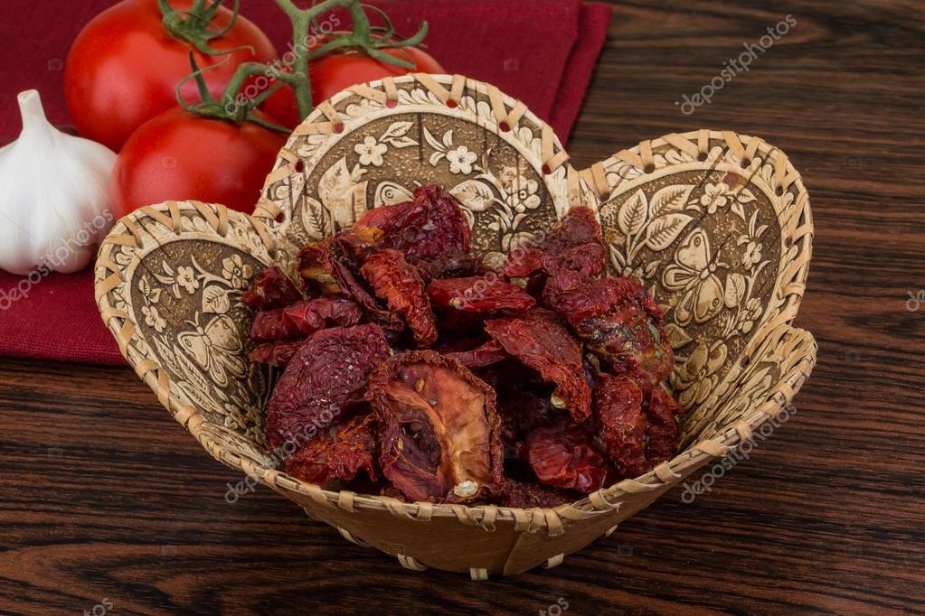 Dried tomtoes Stock Photo by ©AndreySt 61549179