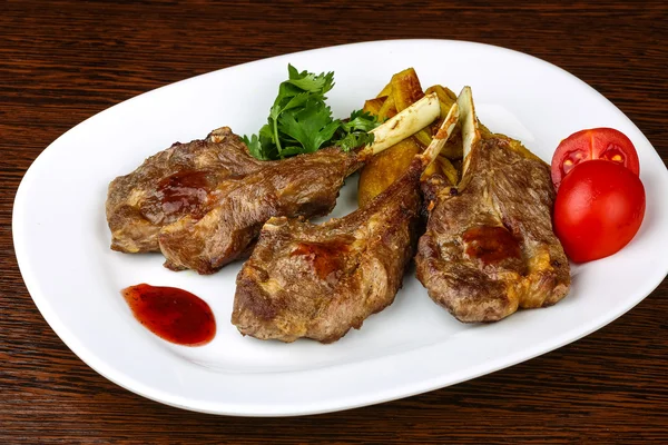 Costeletas de cordeiro em legumes Stock Photos, Royalty Free Costeletas ...