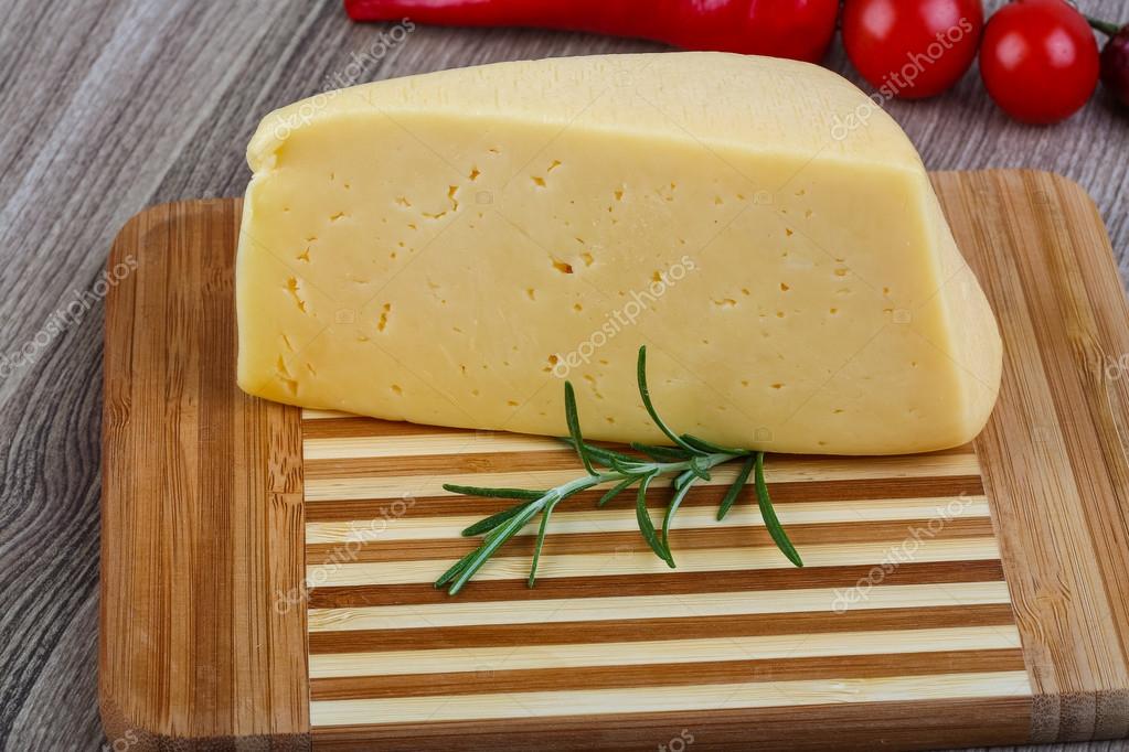 Yellow cheese triangle — Stock Photo © AndreySt #91117972