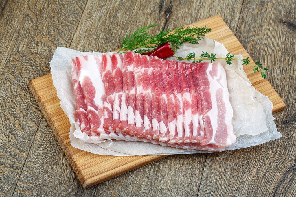 Raw sliced bacon — Stock Photo © AndreySt #92970974