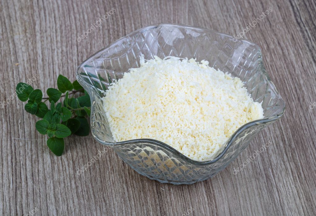 Shredded parmesan cheese — Stock Photo © AndreySt #94639170