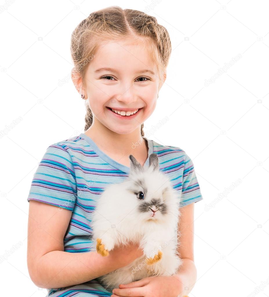Little girl with a rabbit Stock Photo by ©tan4ikk 66635453