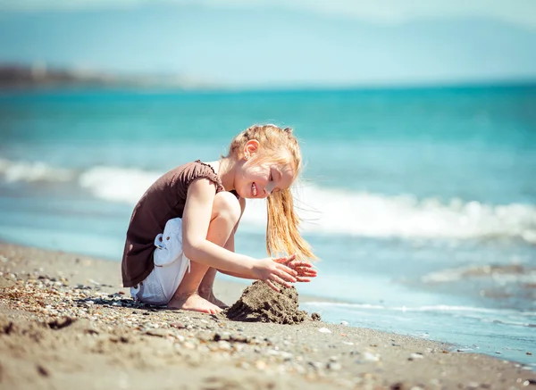 Little girl on the beach — Stock Photo © tan4ikk #22800498