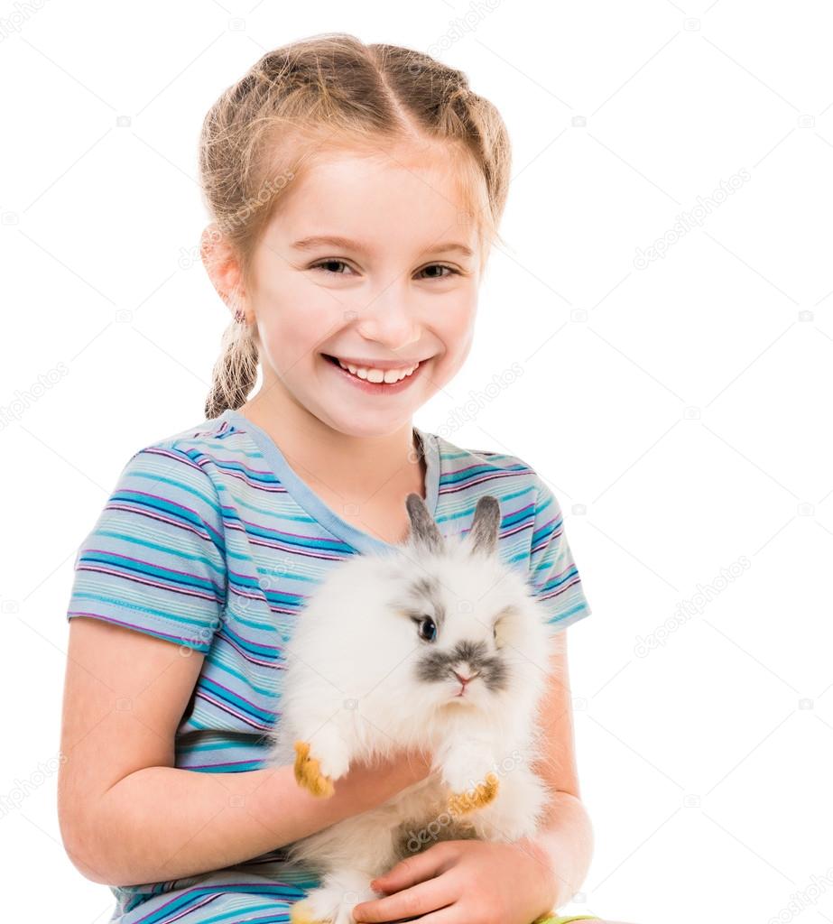 Little girl with rabbit Stock Photo by ©tan4ikk 79691960