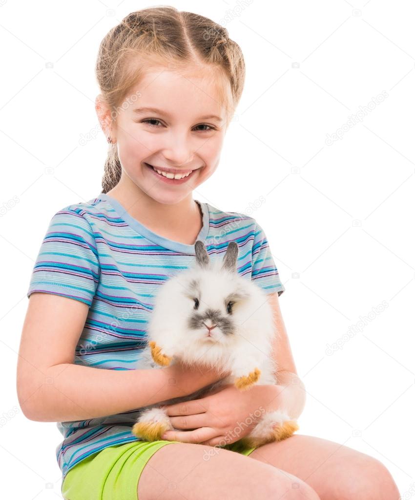 Little girl with a rabbit Stock Photo by ©tan4ikk 98465588