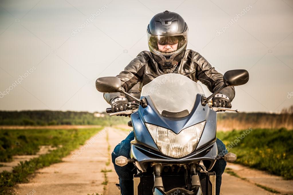 Biker racing on the road — Stock Photo © cookelma #70112821