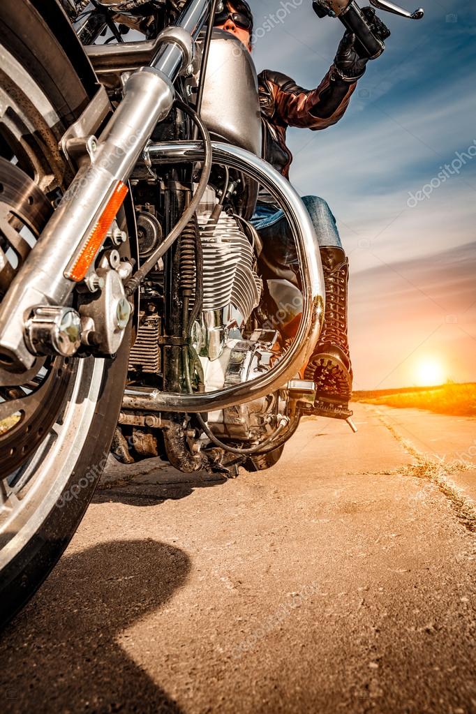 Biker girl riding on a motorcycle — Stock Photo © cookelma #81872054