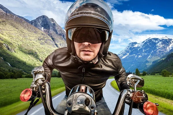 Biker racing on the road - Stock Image - Everypixel