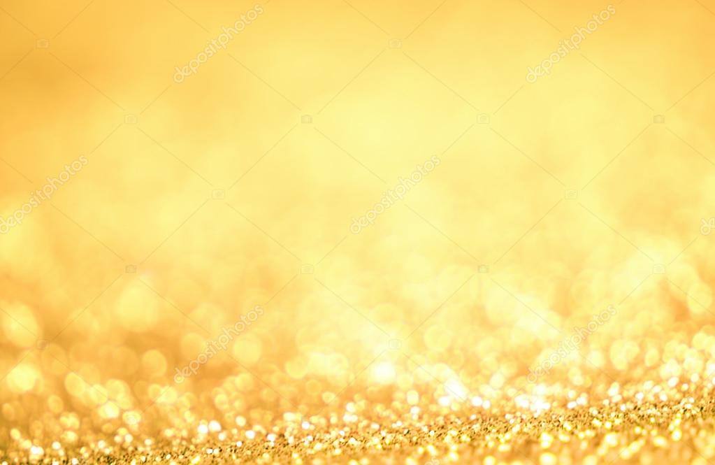 Gold defocused glitter background Stock Photo by ©Paulpaladin 84798798