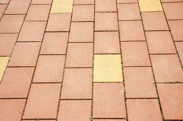 Red brick pavement background — Stock Photo © llawenydd@mail.ru #106651412
