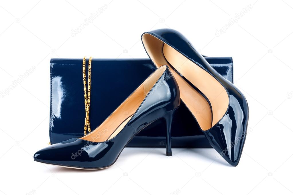 Beautiful blue shoes with clutches on white isolated background Stock ...