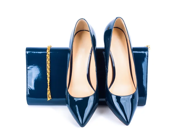 Beautiful blue shoes with clutches on white isolated background Stock ...