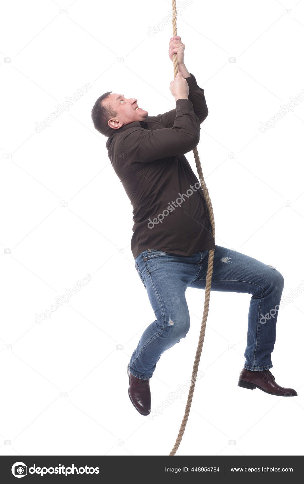 Purposeful man climbing the rope. isolated on a white background. Stock ...
