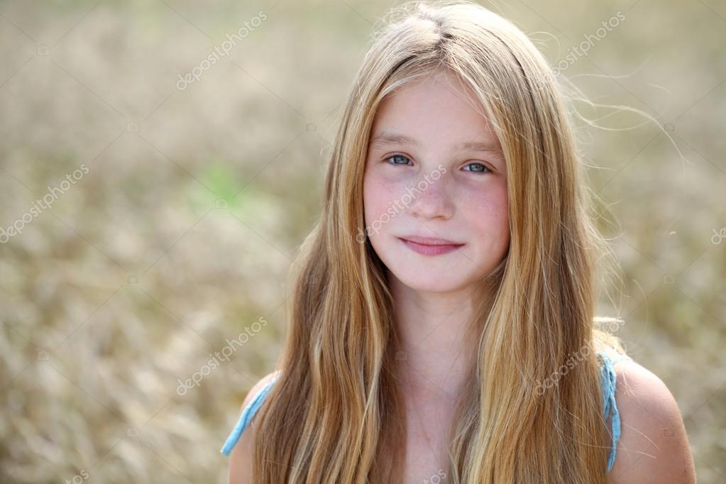 Portrait of a beautiful young little girl — Stock Photo © arkusha #119721212