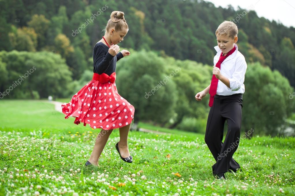 Childrens retro dance couple in suits — Stock Photo © arkusha #120765108